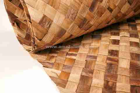 Each Bac-Bac Mat is hand woven with beige and brown hues